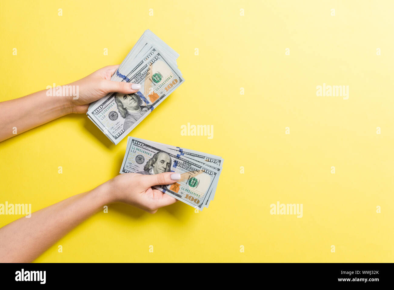 Top view of female hand giving some money, Close-up of counting one ...