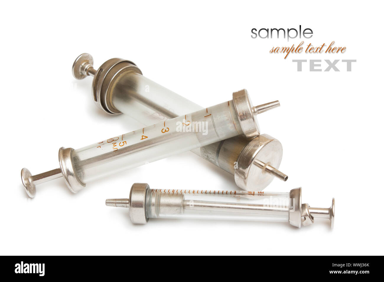 syringes old model on a white background Stock Photo - Alamy
