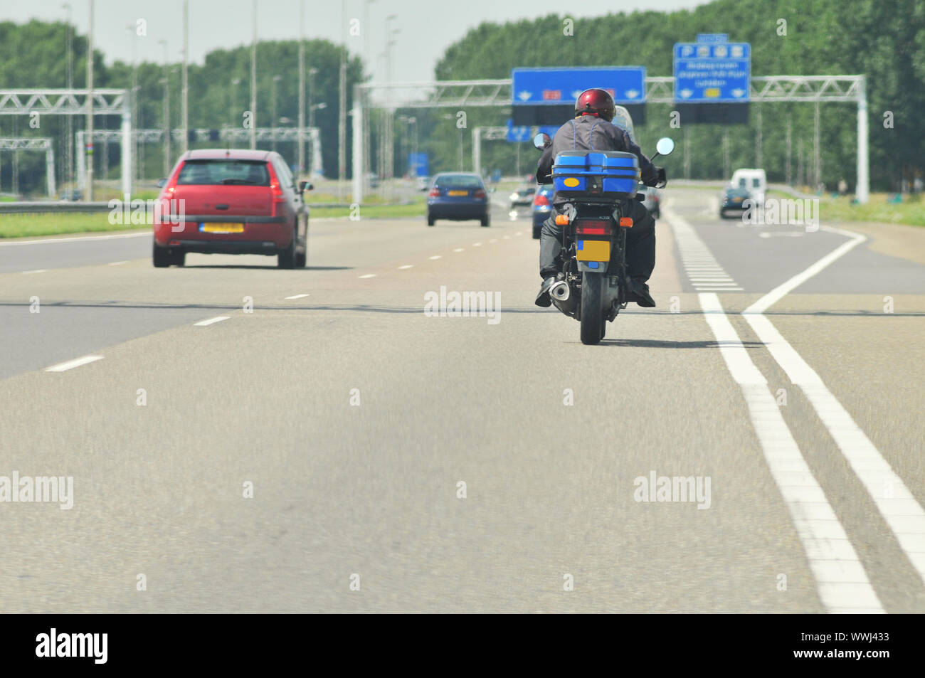 traffic at the highway with cars and motor Stock Photo - Alamy