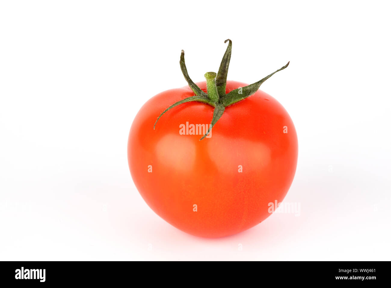 one tomato isolated on white background Stock Photo - Alamy