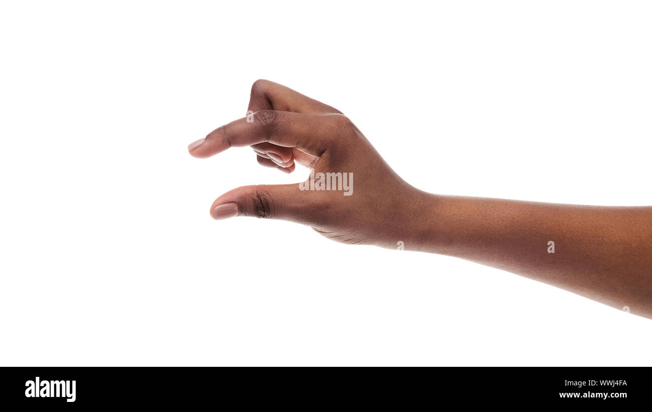 Black hand showing small amount of something on white background Stock ...