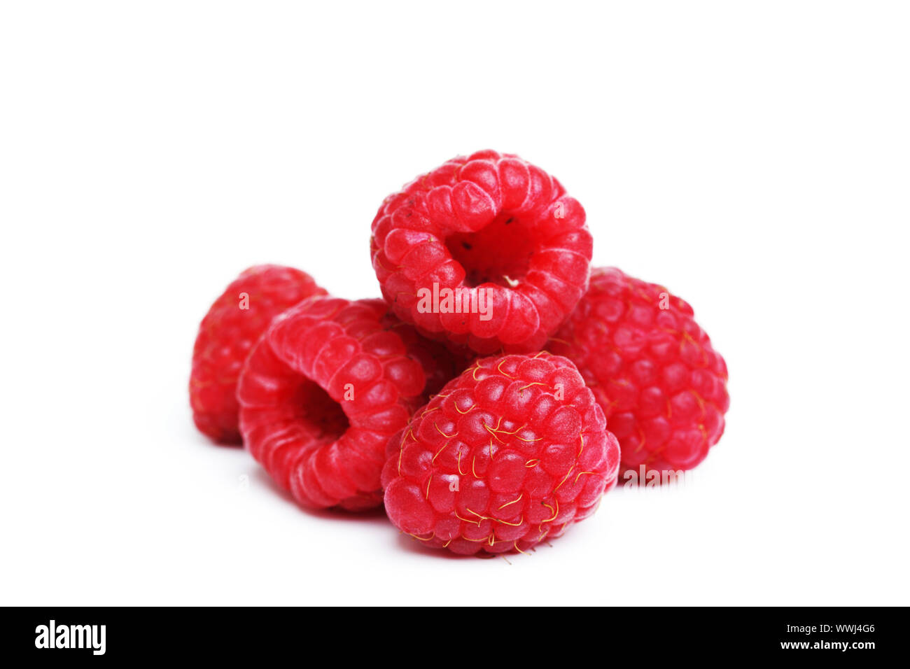 raspberry pile isolated on white Stock Photo - Alamy