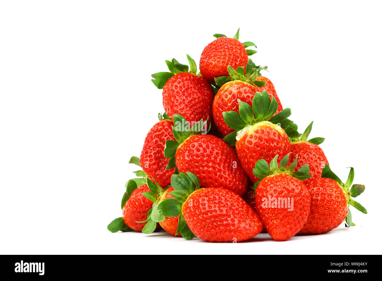 strawberry pile isolated on white background Stock Photo - Alamy