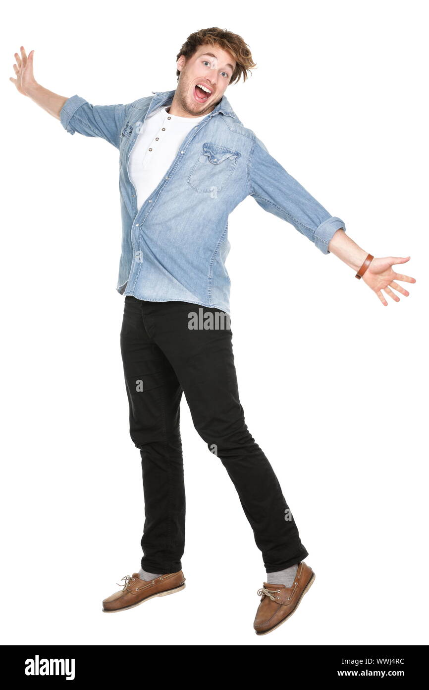 Man jumping excited in full body isolated on white background. Casual ...
