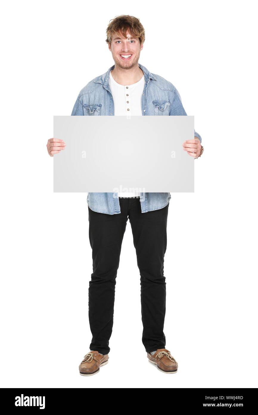Man showing sign standing in full body. Casual young guy holding blank ...