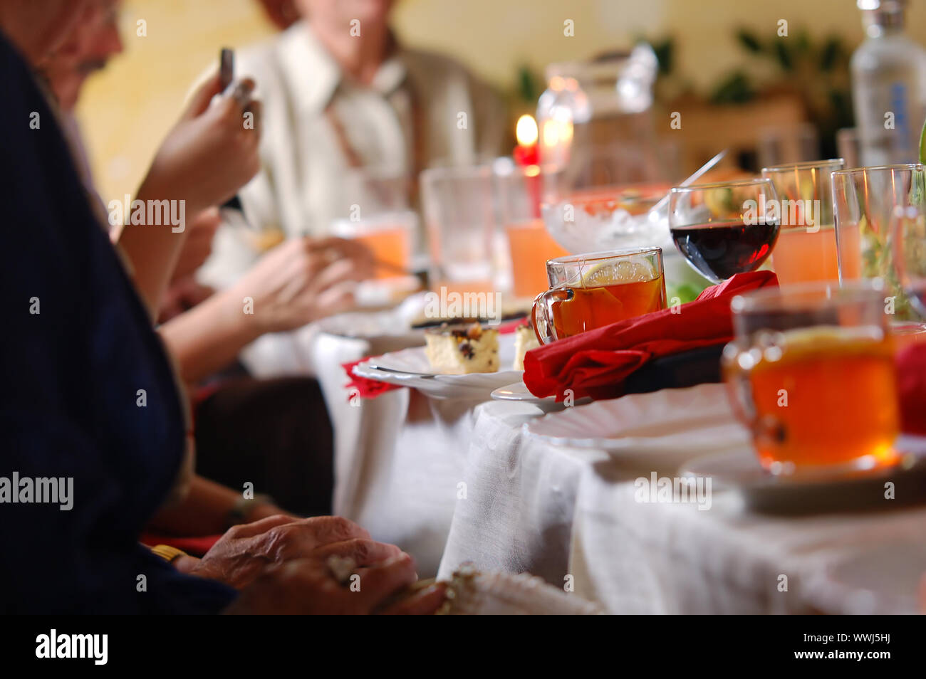 Reception setting. People sitting around the table Stock Photo - Alamy