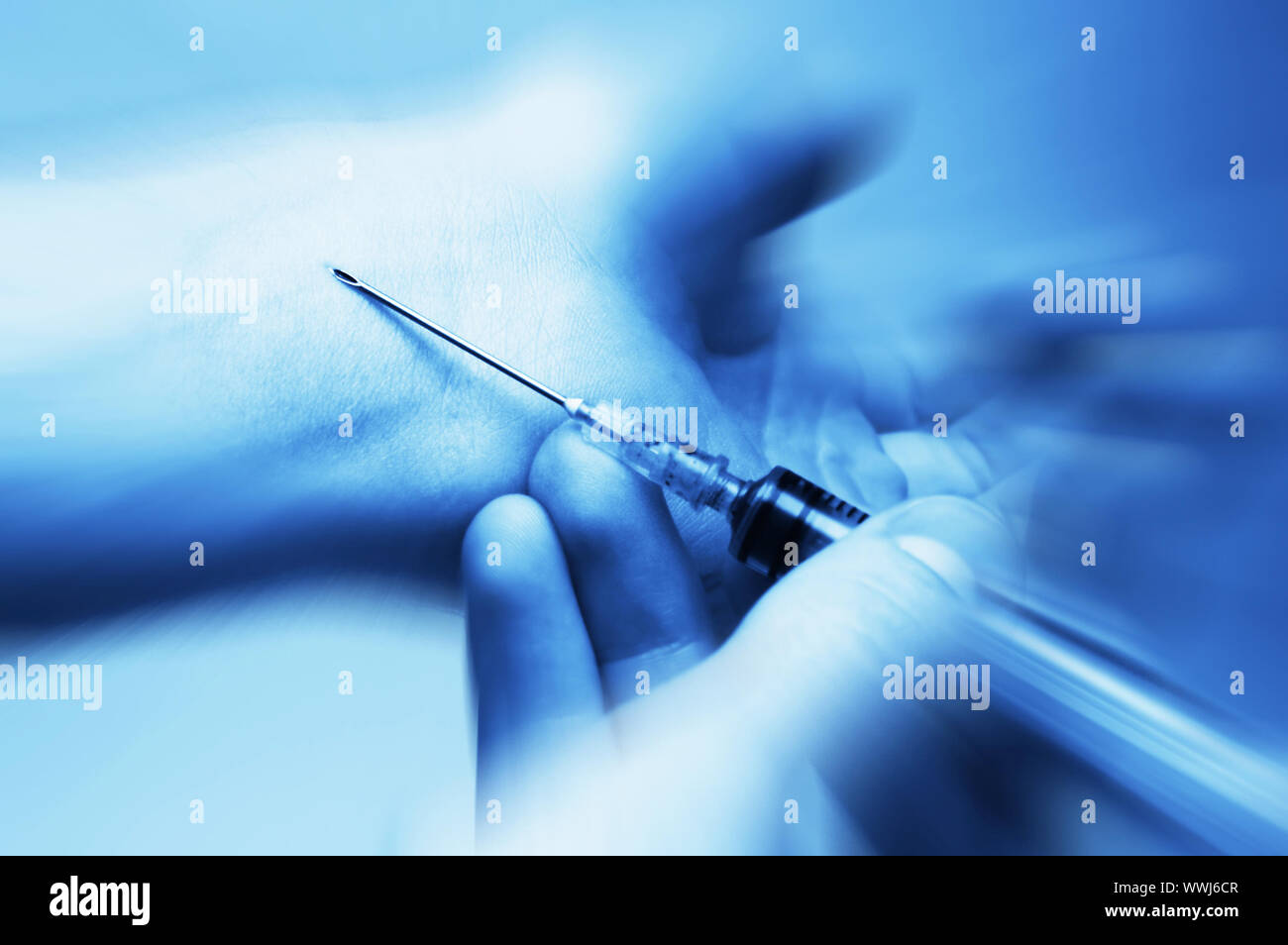 Injection of a drug in a vein conceptual image Stock Photo - Alamy