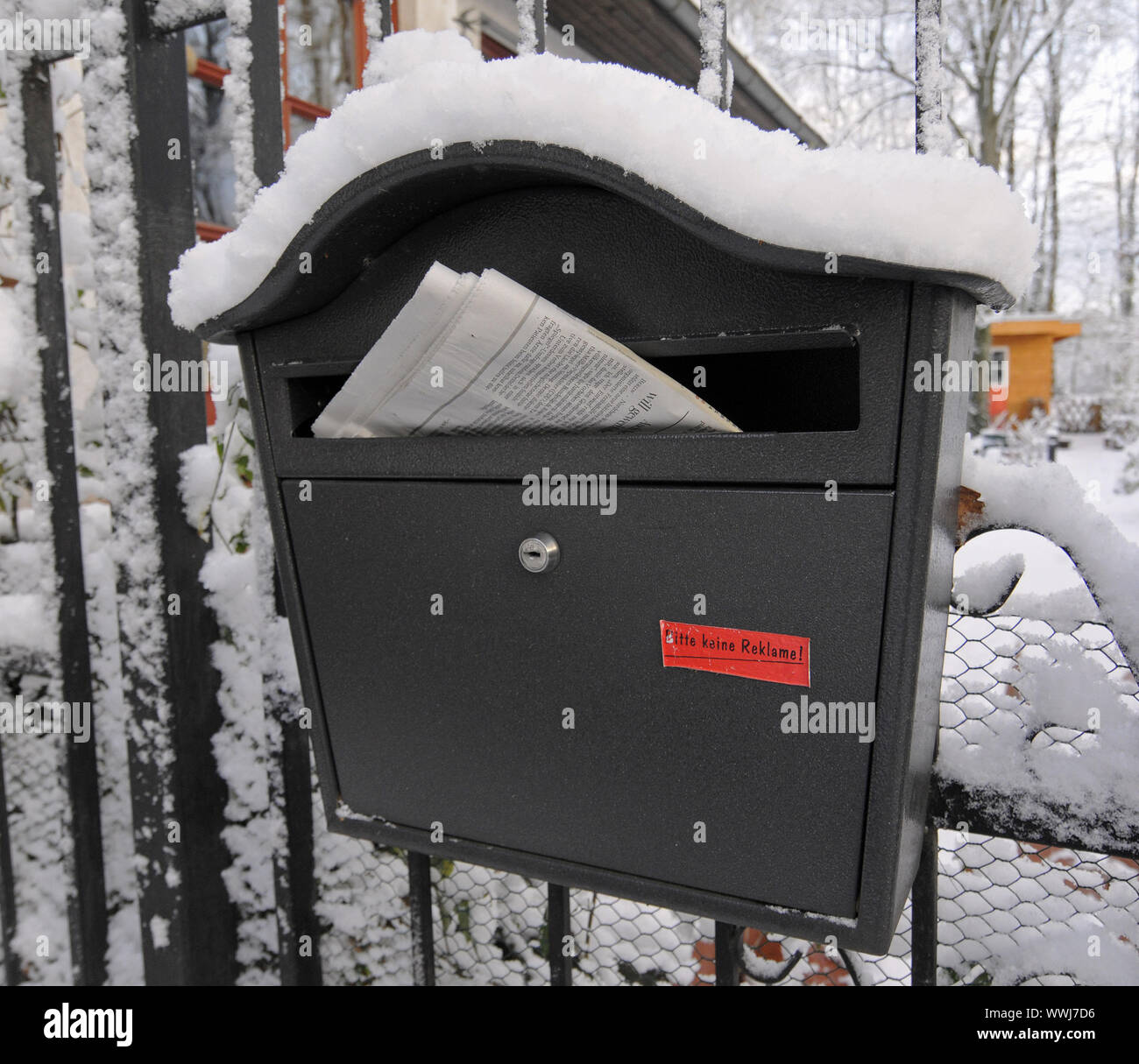 snow-covered letterbox with the Sunday newspaper Stock Photo - Alamy