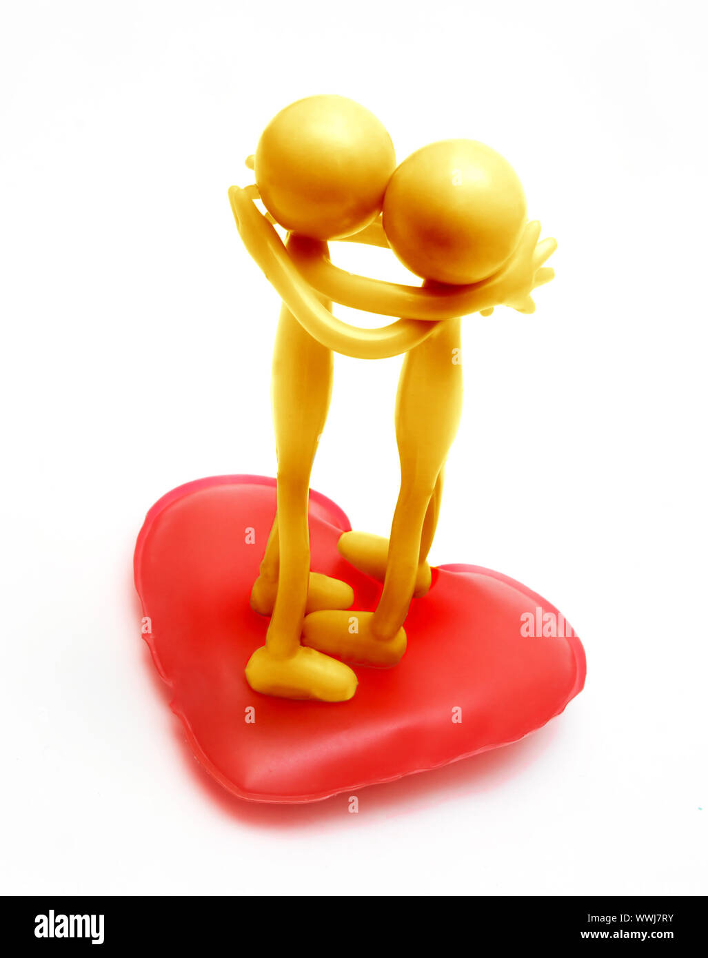 Love concept. Two human figures hugging each other on the red heart ...