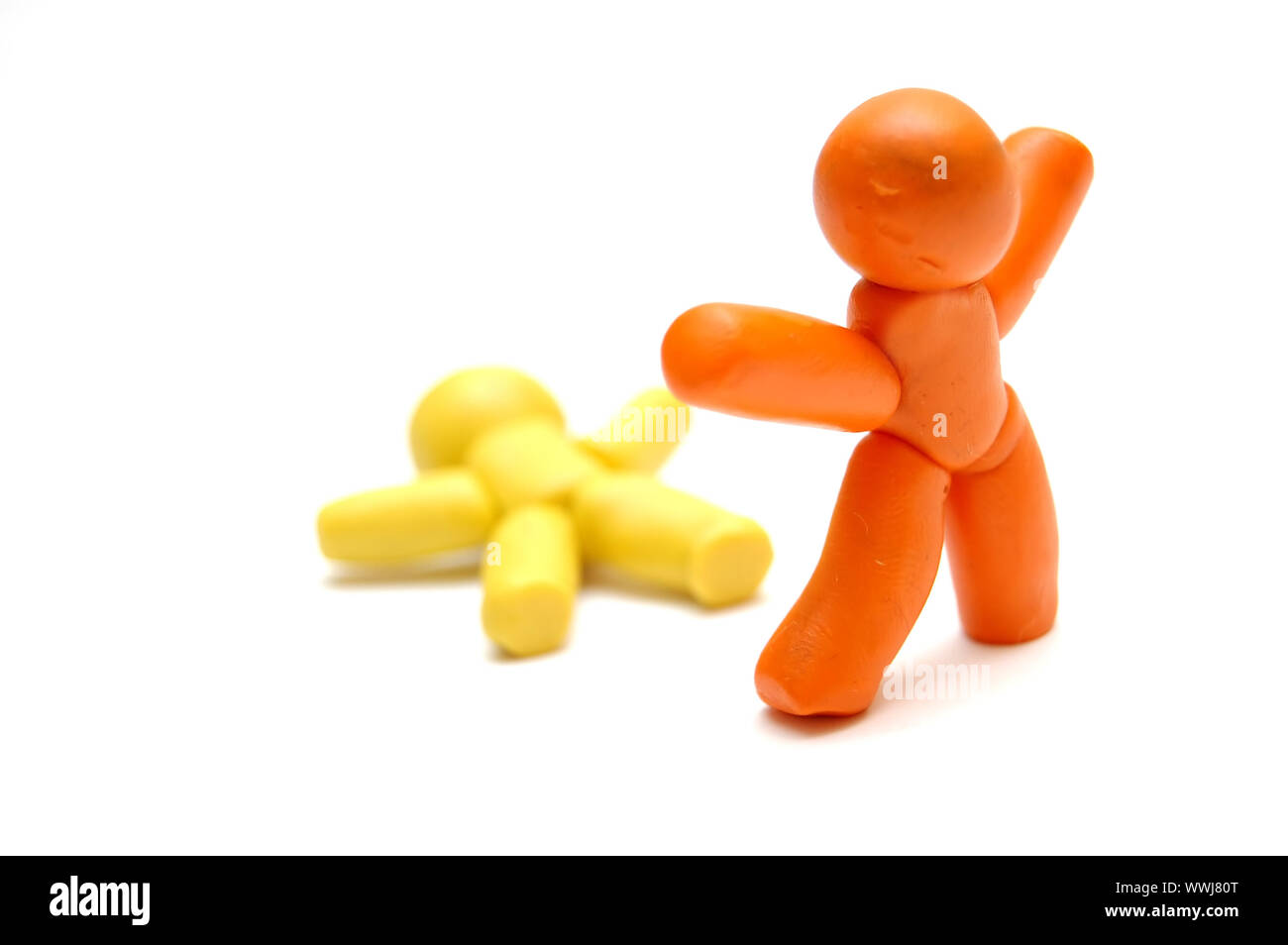 Plasticine figure staying with winner gesture Stock Photo - Alamy
