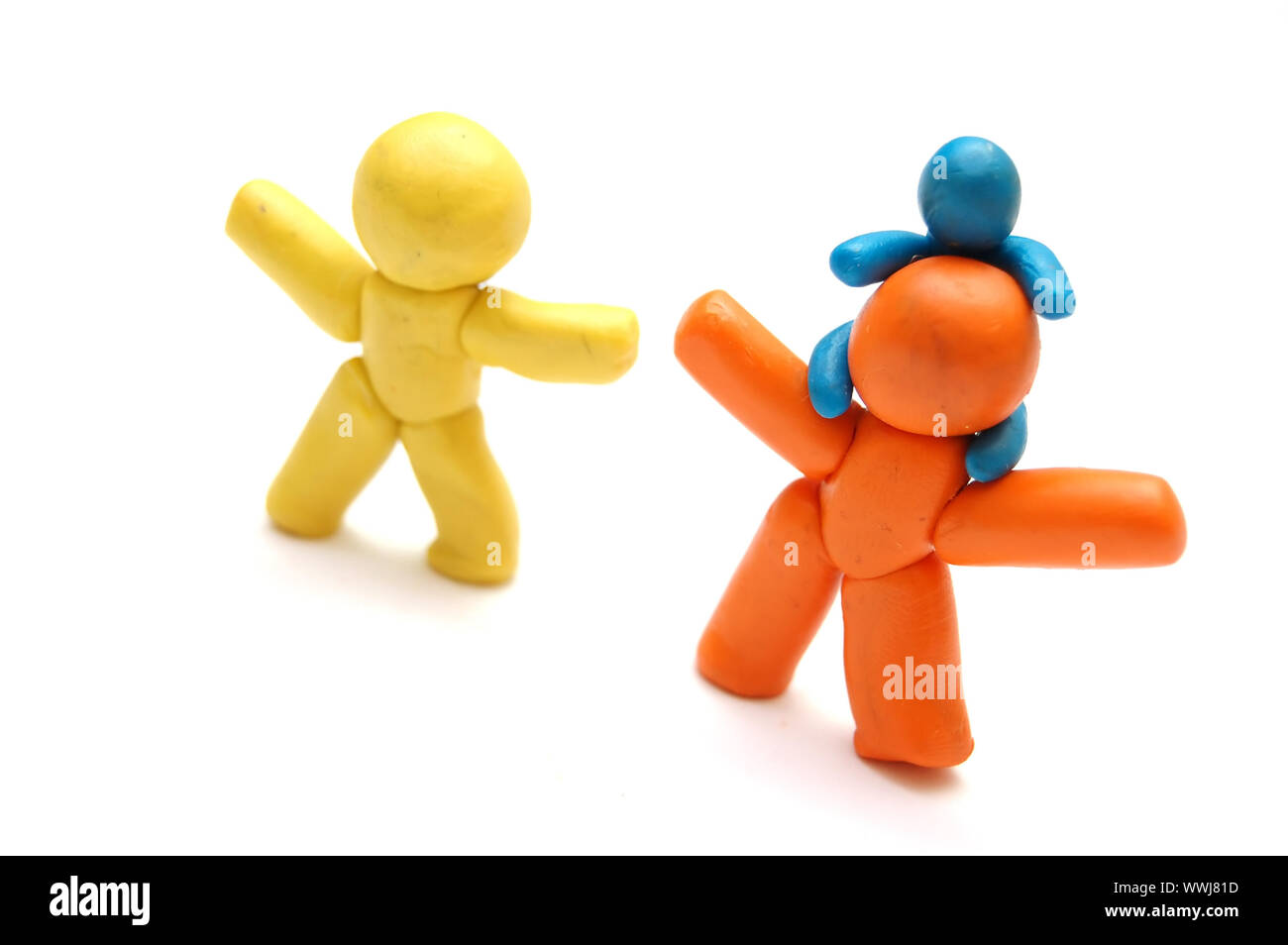 Happy family. 3 plasticine figures Stock Photo - Alamy
