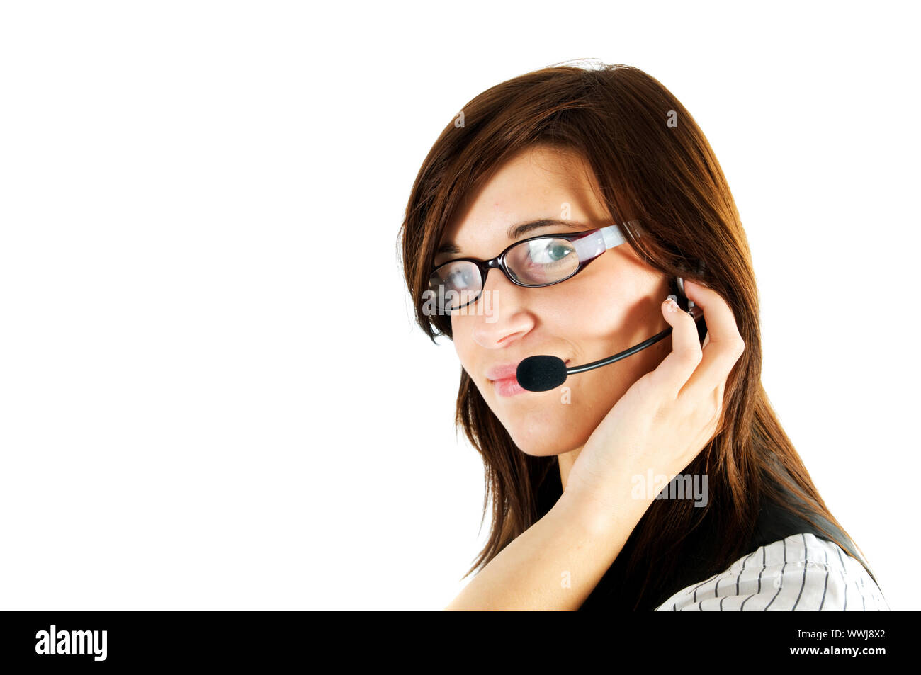Friendly customer service agent smiling during telephone conversation ...