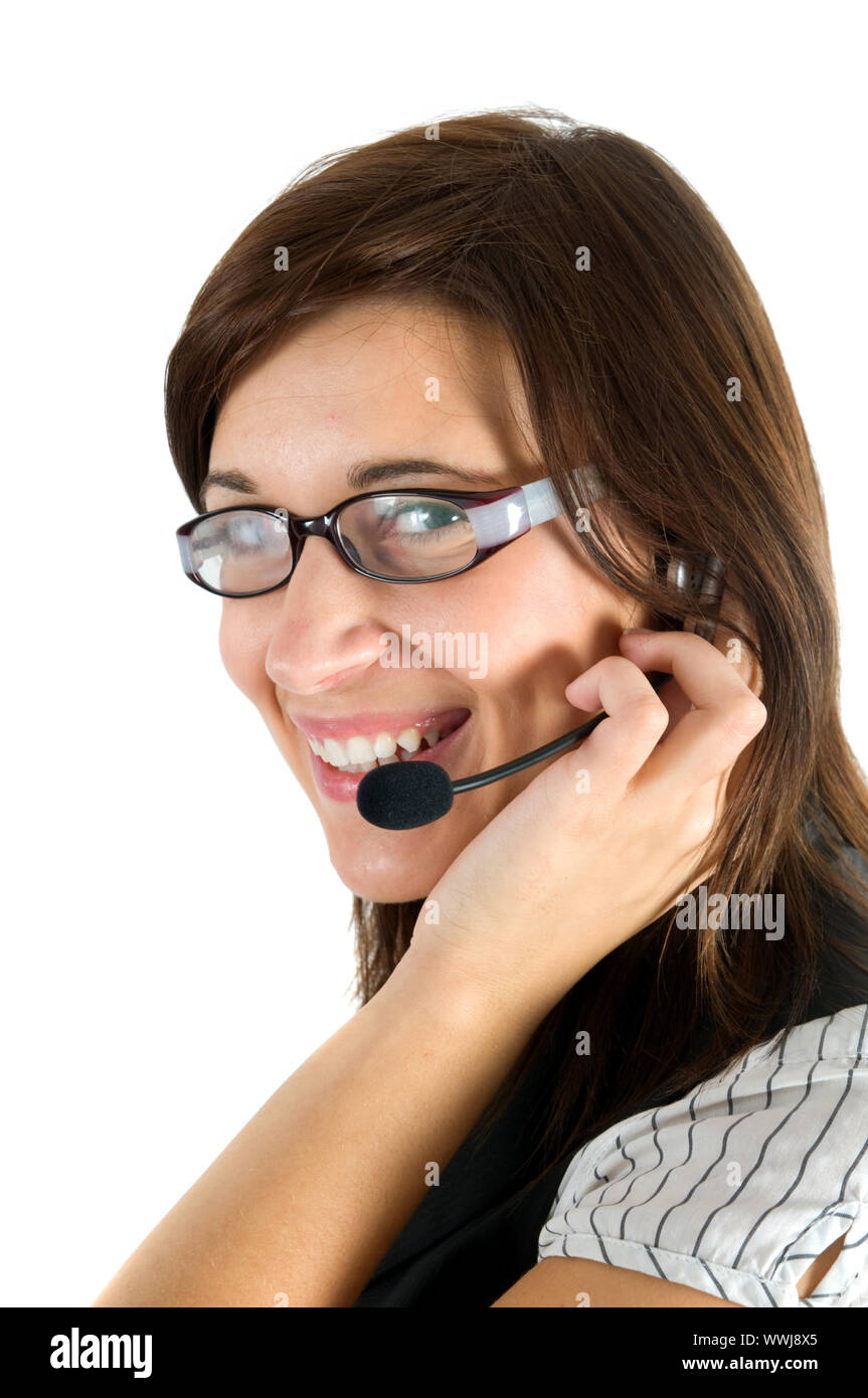 Friendly customer service agent smiling during telephone conversation ...