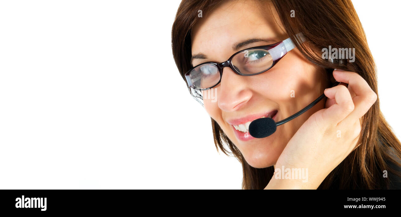 Friendly customer service agent smiling during telephone conversation ...