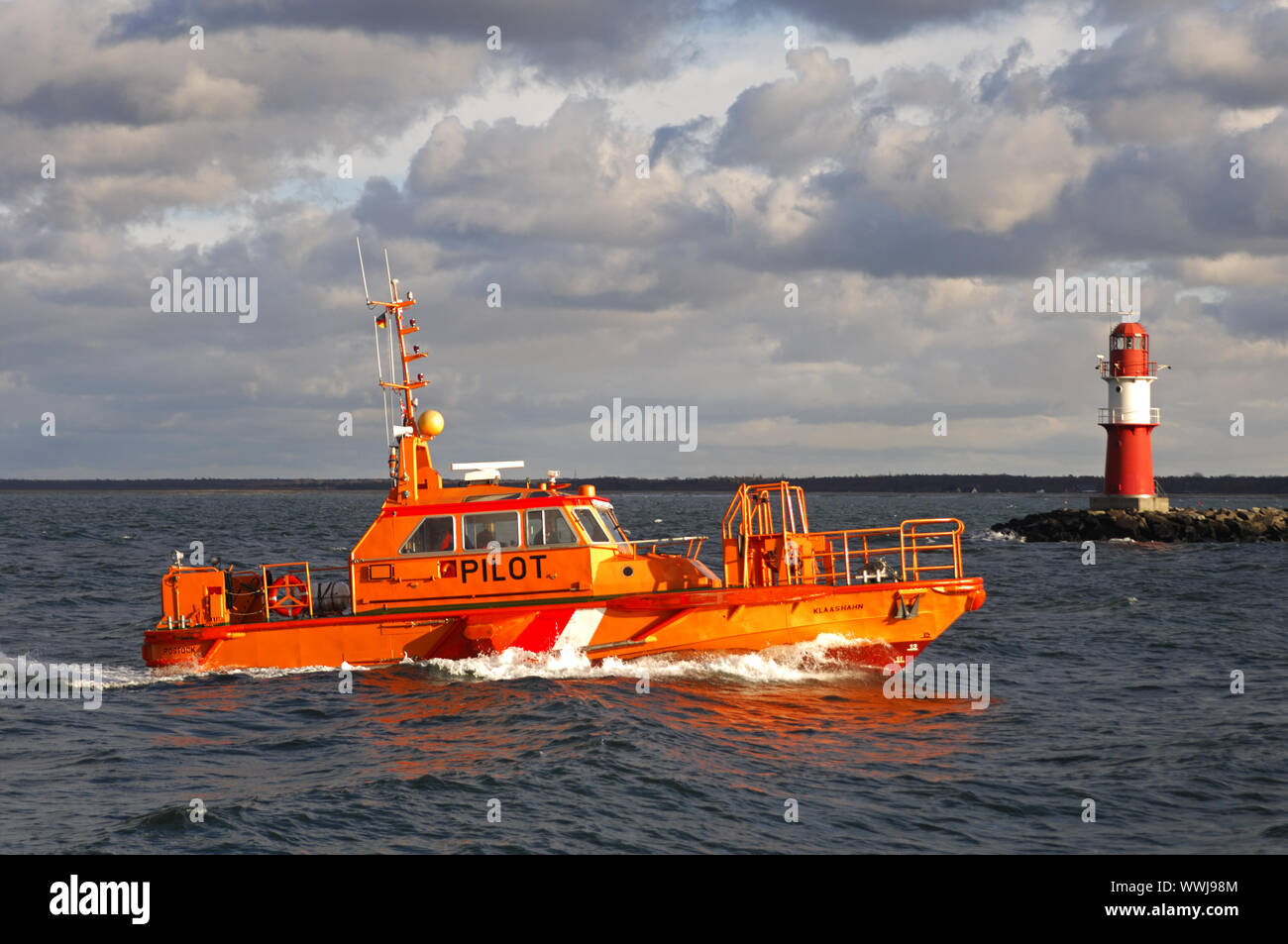 Pilot ship Pilot Klaashahn at the harbour entrance Warnemuende Stock Photo - Alamy
