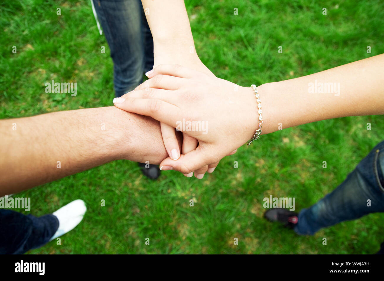 Group of friends joining hands. Unity, teamwork concept Stock Photo - Alamy