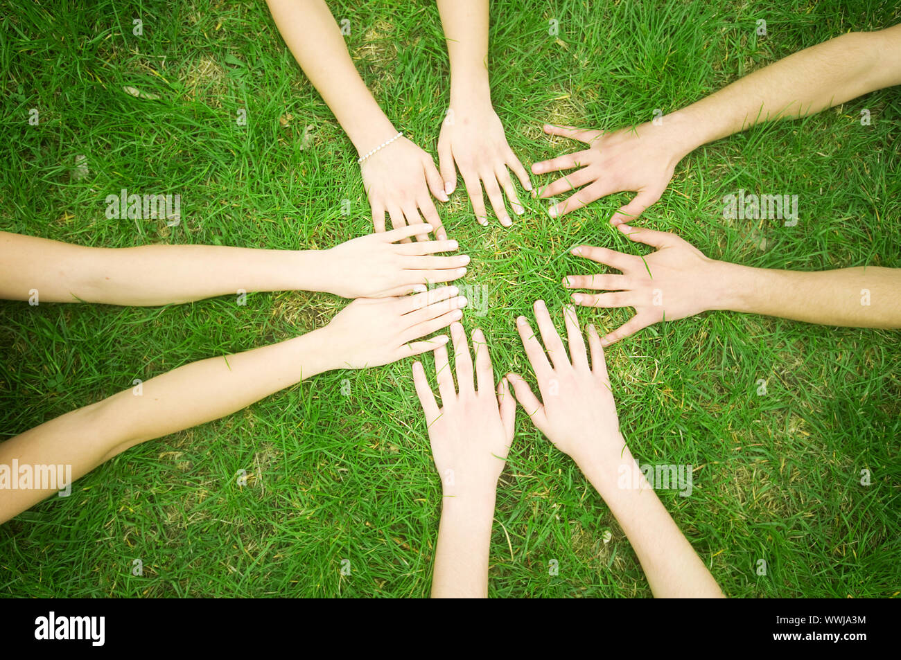Group of friends joining hands. Unity, teamwork concept Stock Photo - Alamy