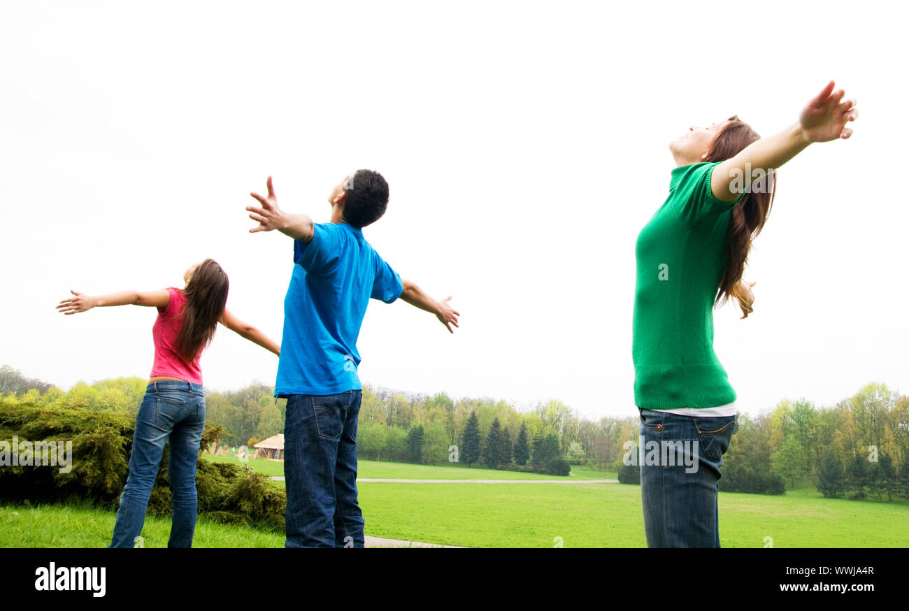 Group of friends expressing freedom Stock Photo - Alamy