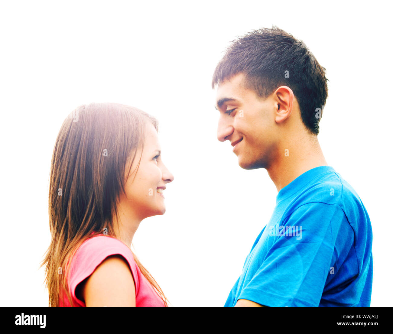Young couple in love looking each other deeply in the eyes Stock Photo ...