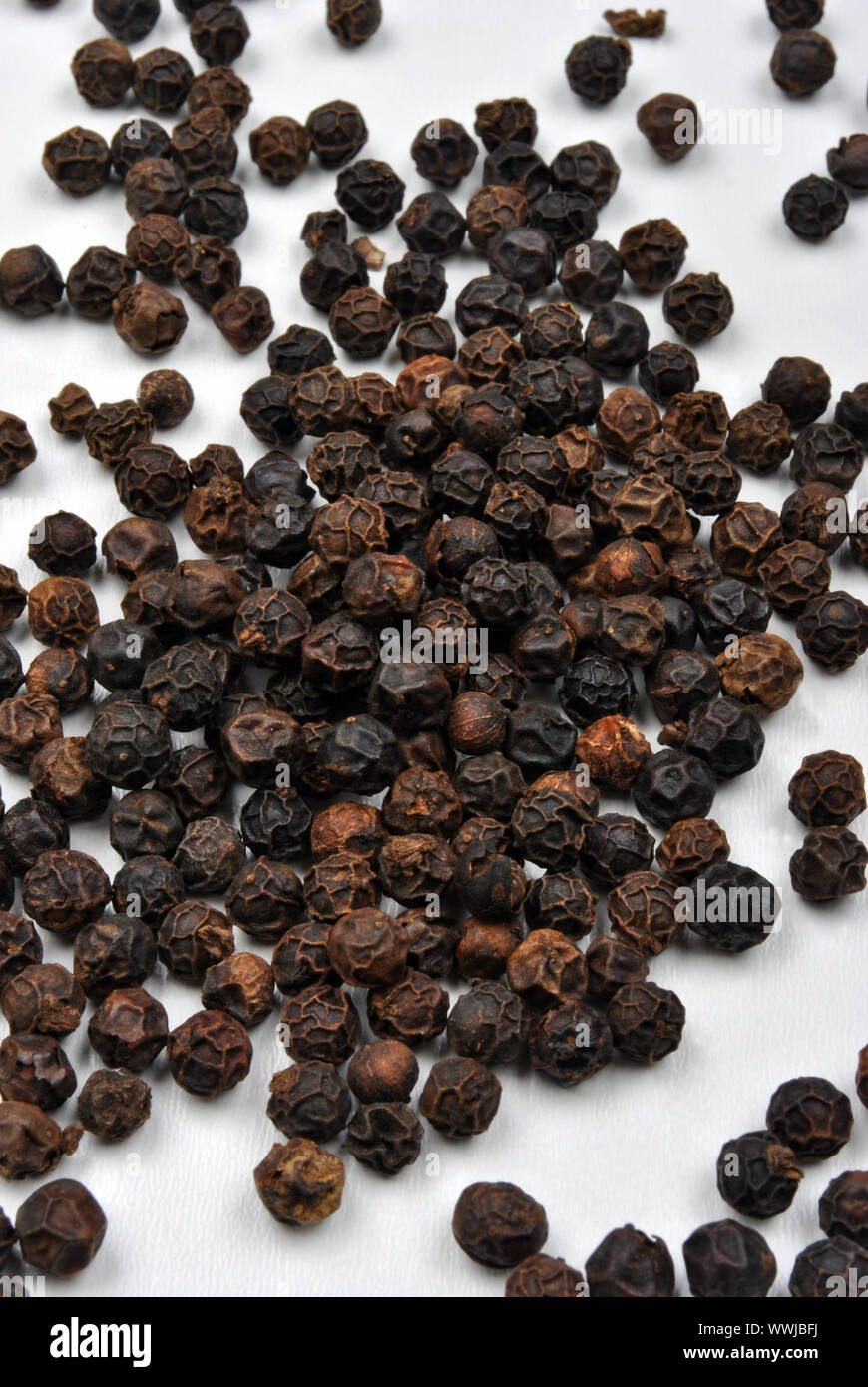 whole organic black pepper is a traditional spice Stock Photo - Alamy