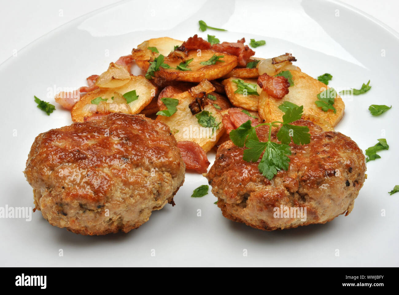 roasted potato with rissole and organic parsley Stock Photo - Alamy