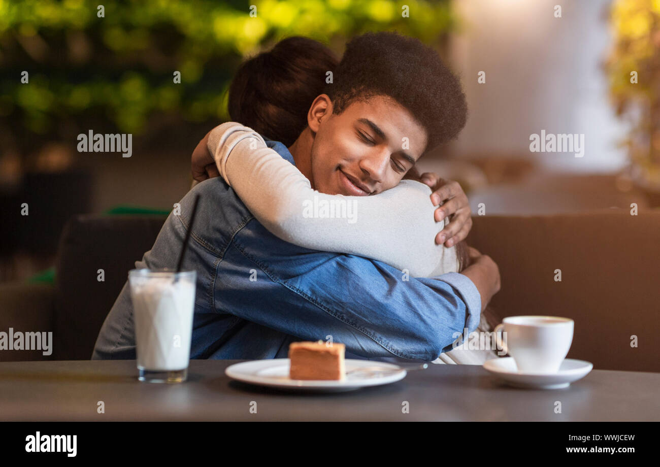 Happy beloved teen couple hugging with affection Stock Photo - Alamy