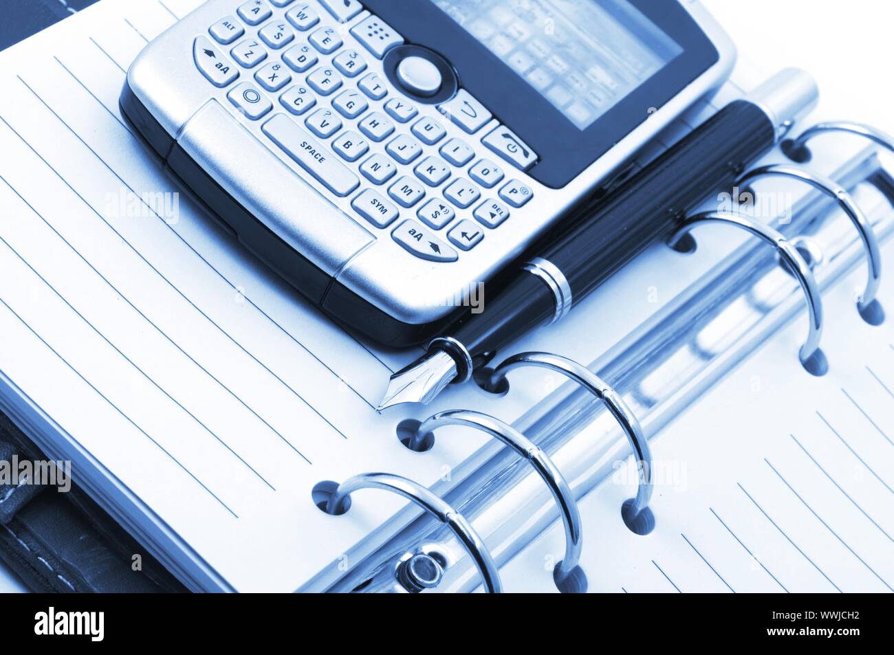 notebook and smart phone showing business concept Stock Photo - Alamy