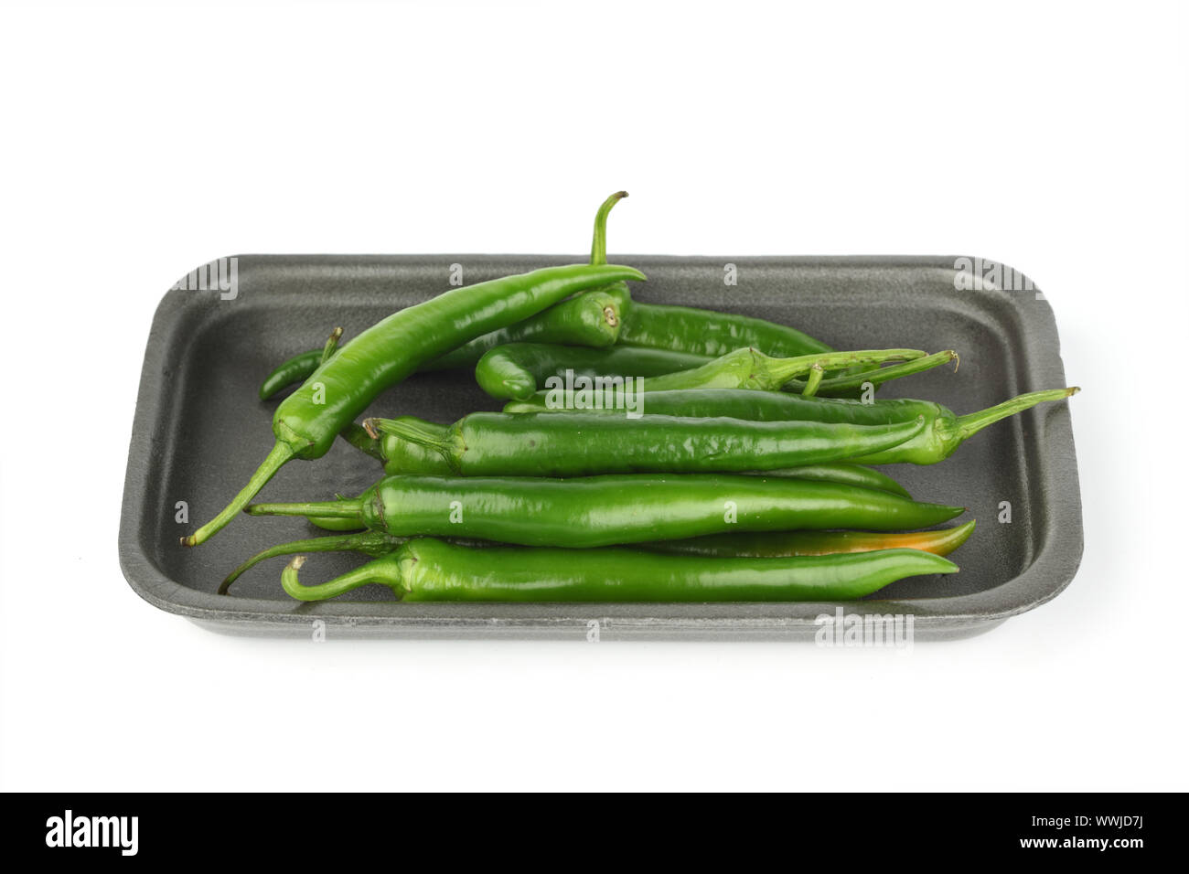 chilli pepper pack isolated on white background Stock Photo - Alamy