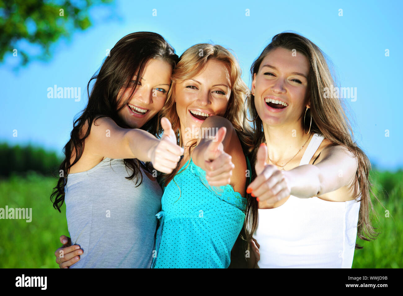 Success joy of girlfriends say hurray Stock Photo - Alamy