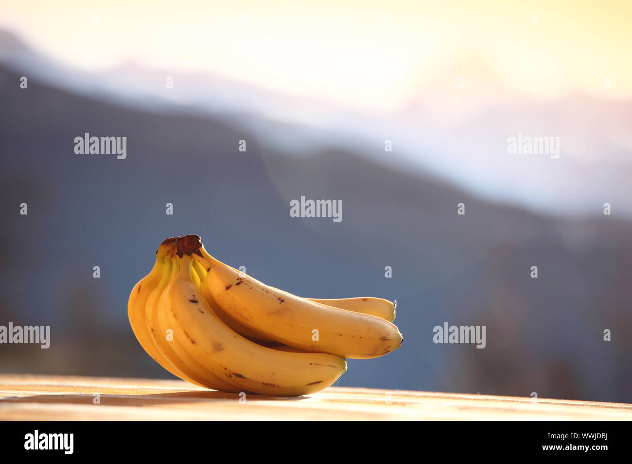 fresh bananas in sunrise light Stock Photo - Alamy