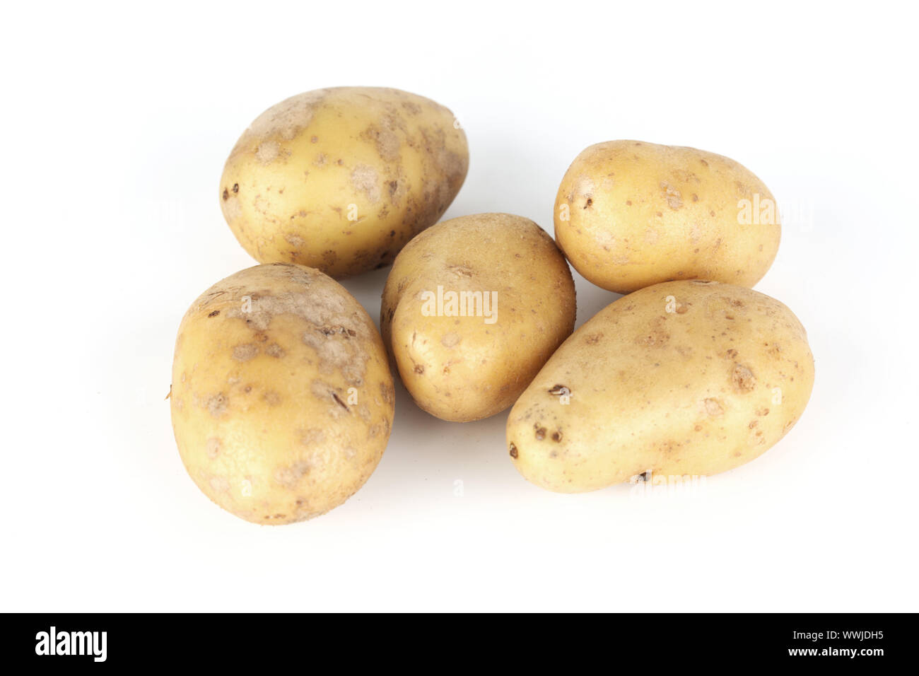 potato pile isolated on white background Stock Photo - Alamy