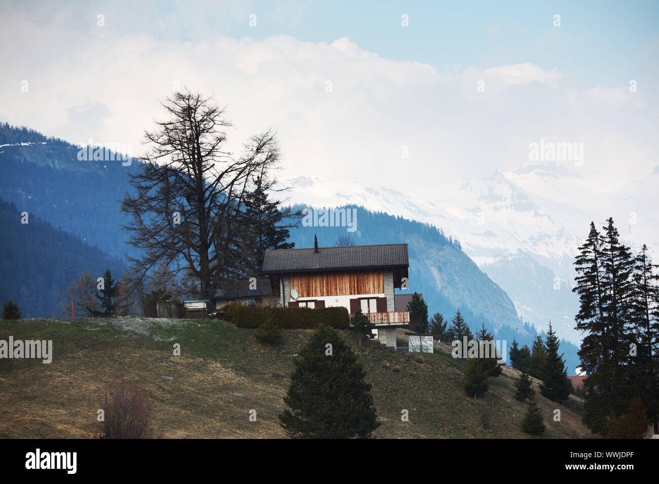 chalet in alpine mountains Stock Photo - Alamy