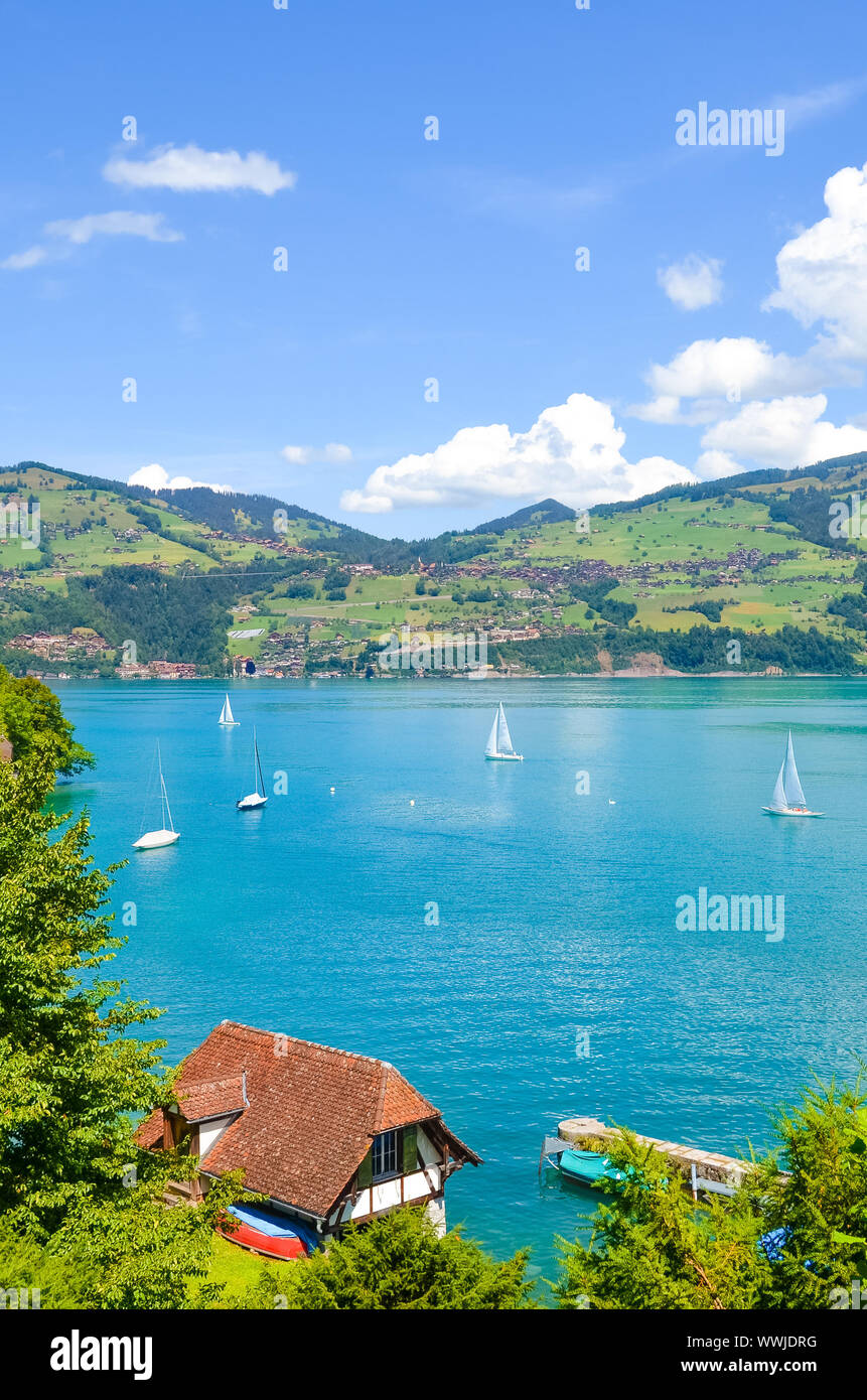Beautiful Lake Thun in Switzerland photographed with sailboats during ...