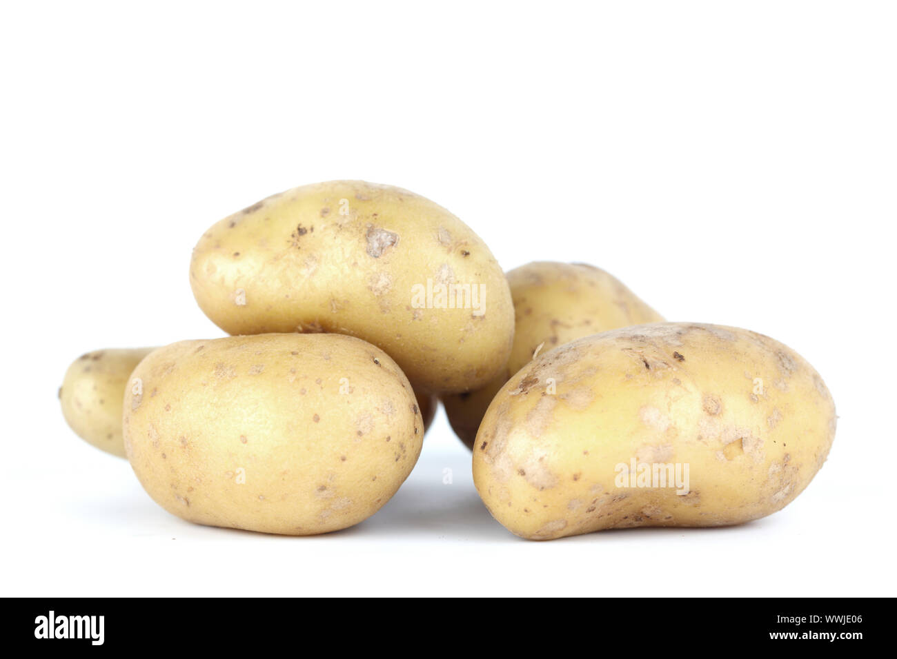 potato pile isolated on white background Stock Photo - Alamy