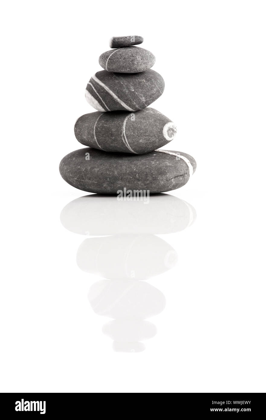 Stones pyramid isolated on white background with reflection Stock Photo ...