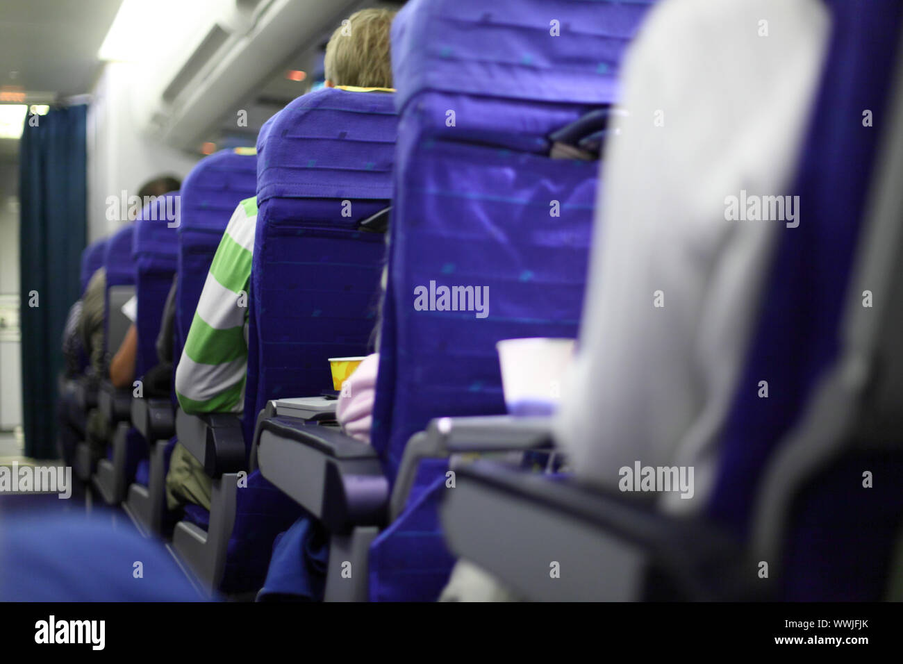 airplane seats in row on board Stock Photo - Alamy