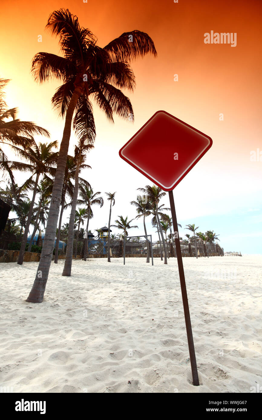 desert sign in sand under palm Stock Photo - Alamy