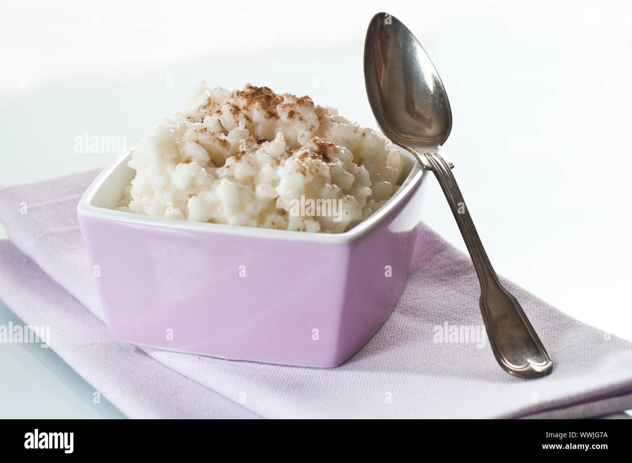Rice pudding in pink bowls Stock Photo - Alamy