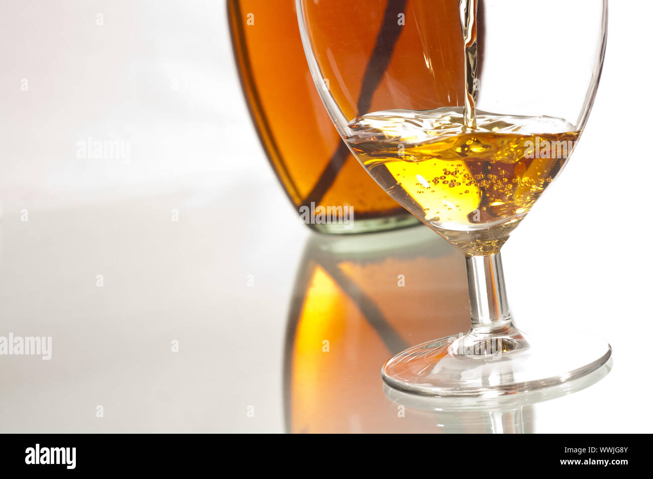 Brandy in a cognac glass Stock Photo - Alamy