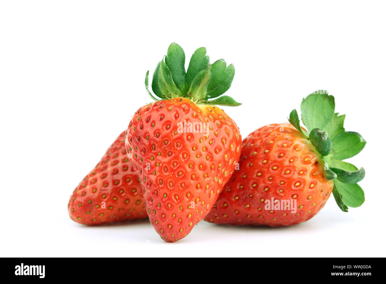 strawberry pile on white background Stock Photo - Alamy