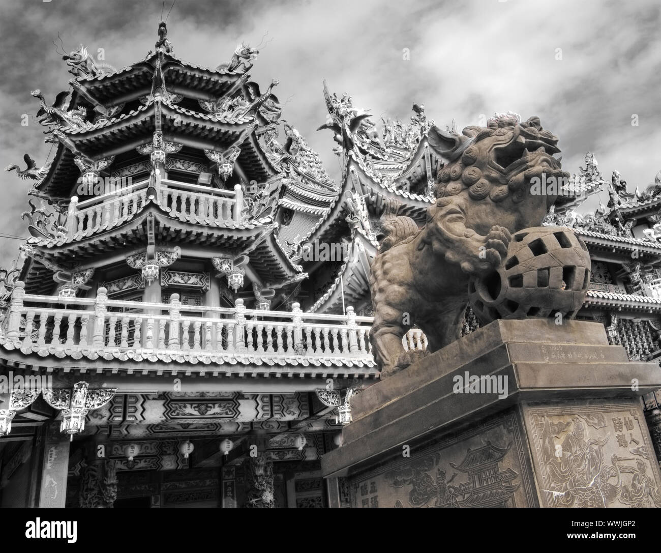 Chinese traditional temple with lion carving stone Stock Photo - Alamy