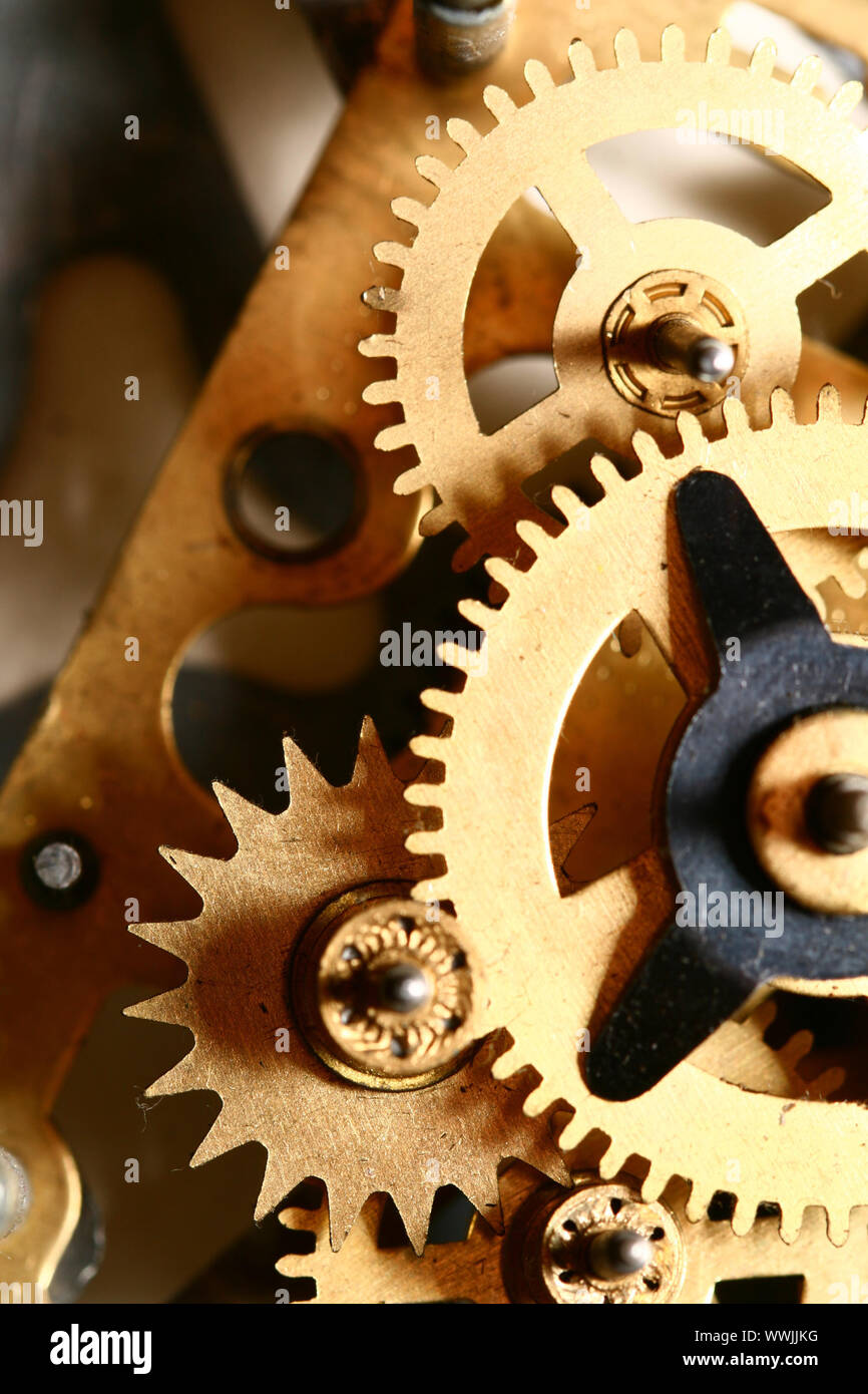time gear inside my rare clock Stock Photo - Alamy