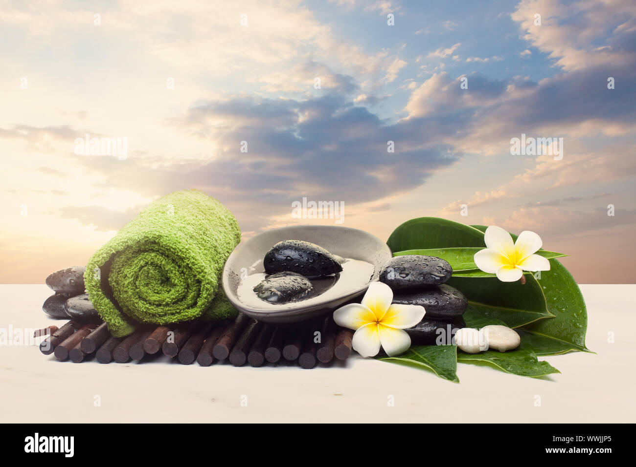 Spa objects with towel and stones for massage therapy. Spa healthy ...