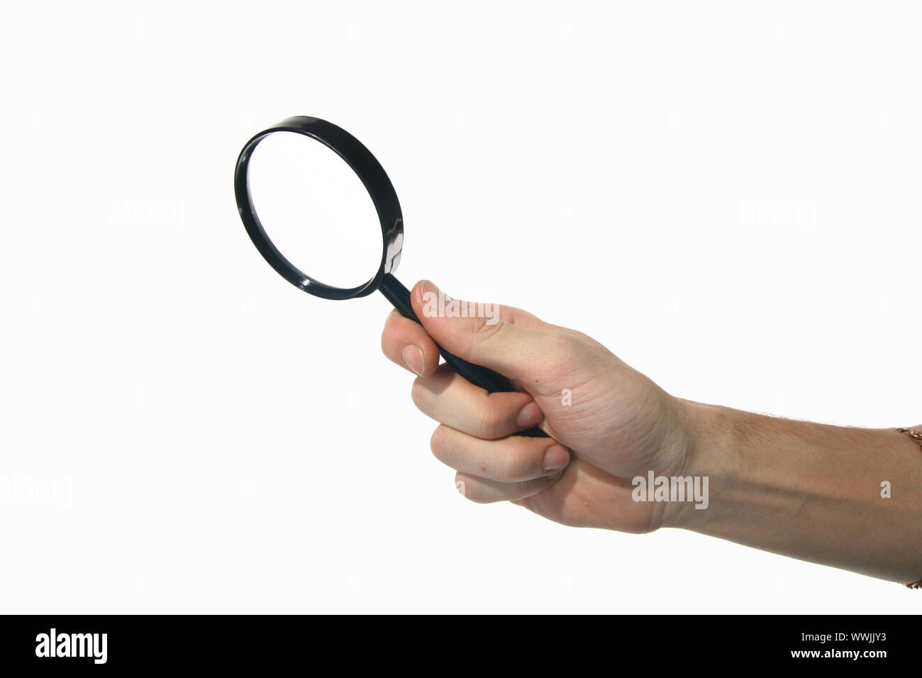Looking through fingers magnifier hi-res stock photography and images ...