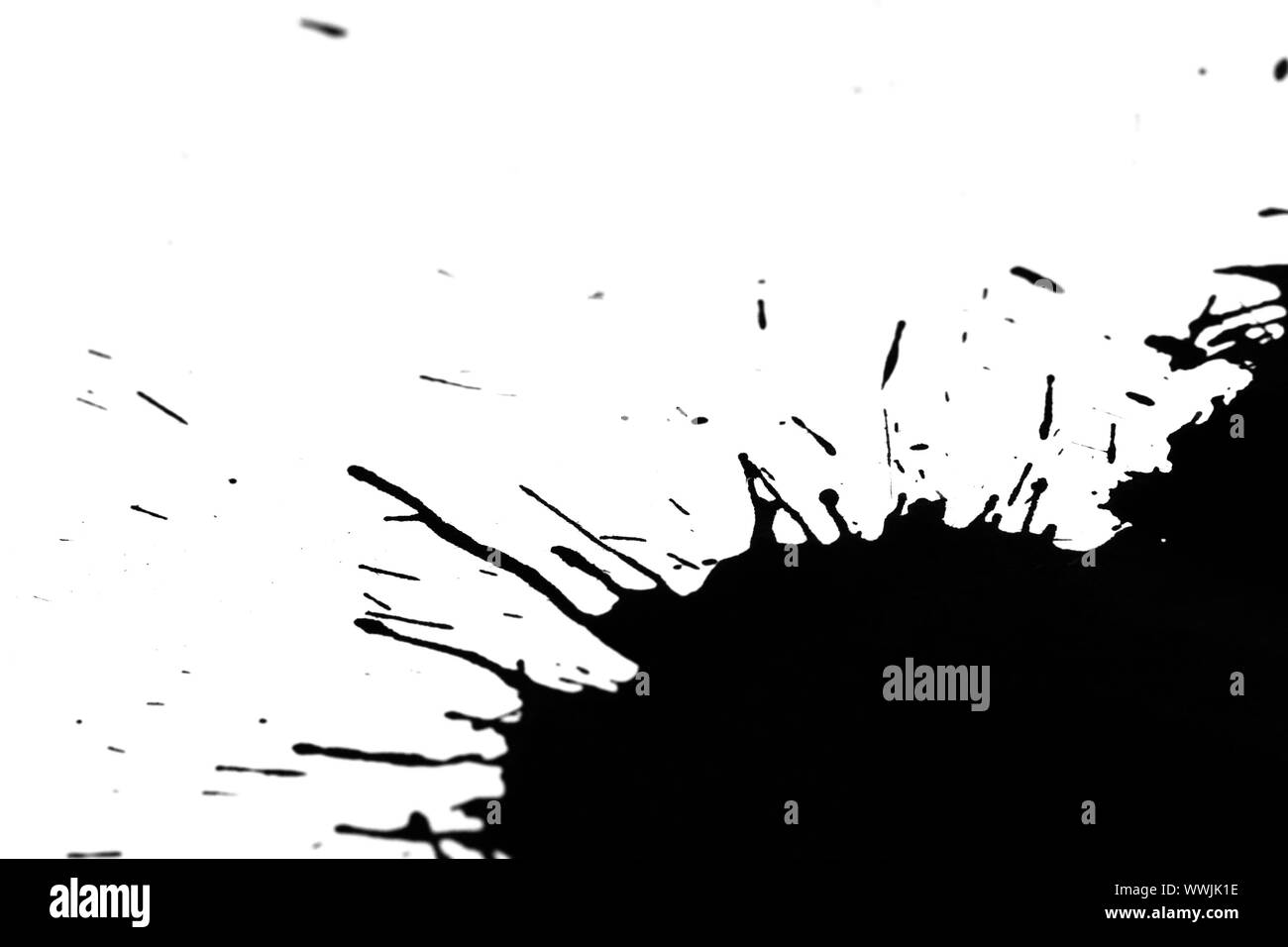 black grunge ink splash on white paper Stock Photo - Alamy