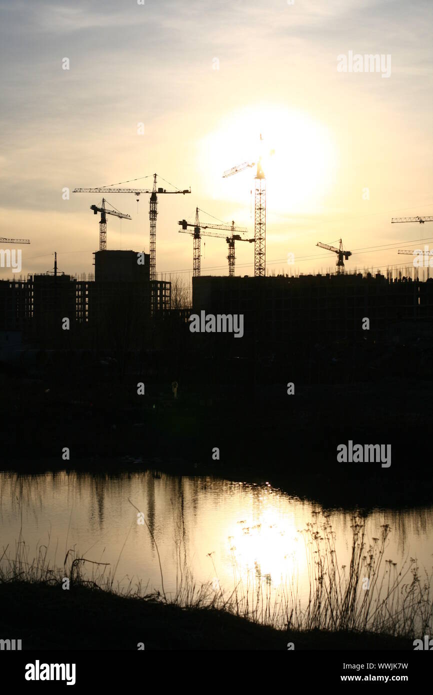 construction sunset industry background Stock Photo - Alamy