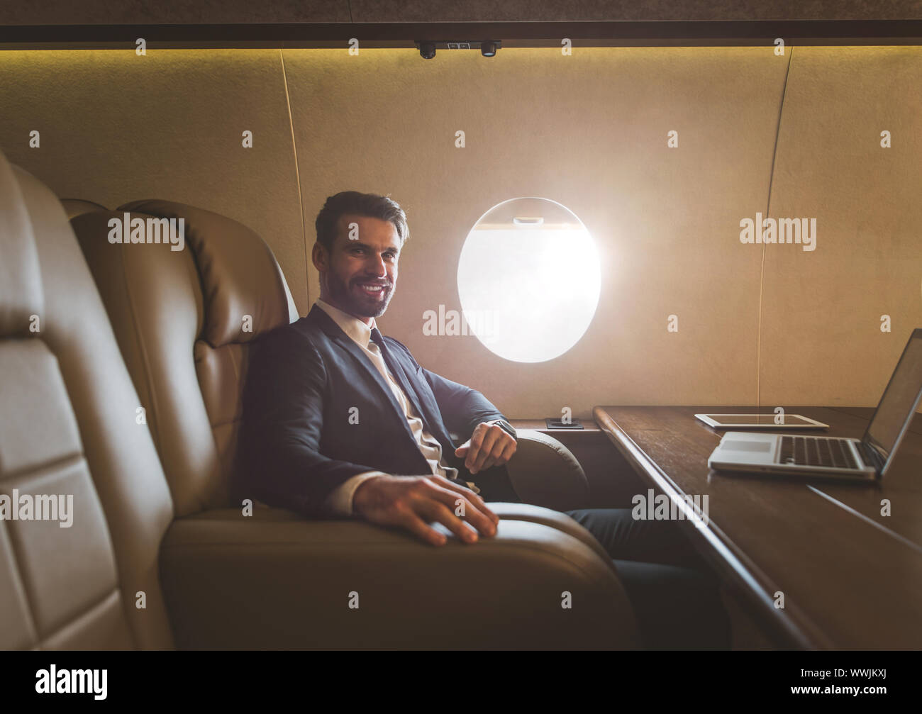 Man looking on private jet hi-res stock photography and images - Alamy