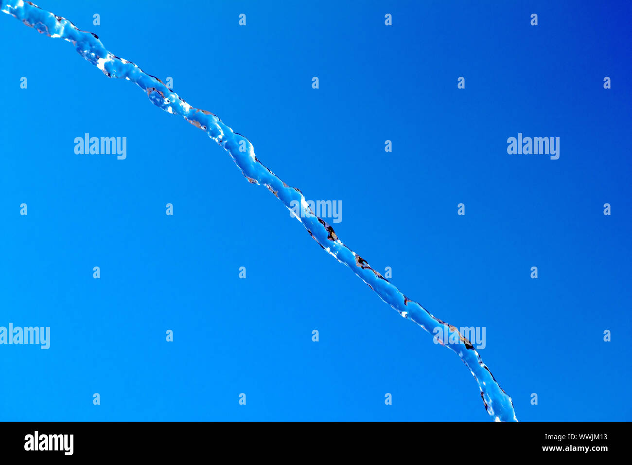 water splash line in blue sky background Stock Photo - Alamy