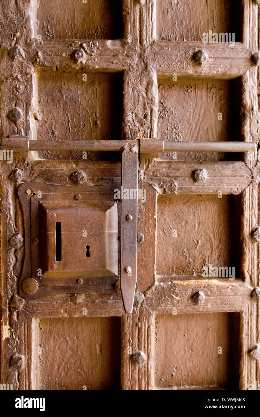 aged medieval wooden door lock keyhole with square shapes Stock Photo ...