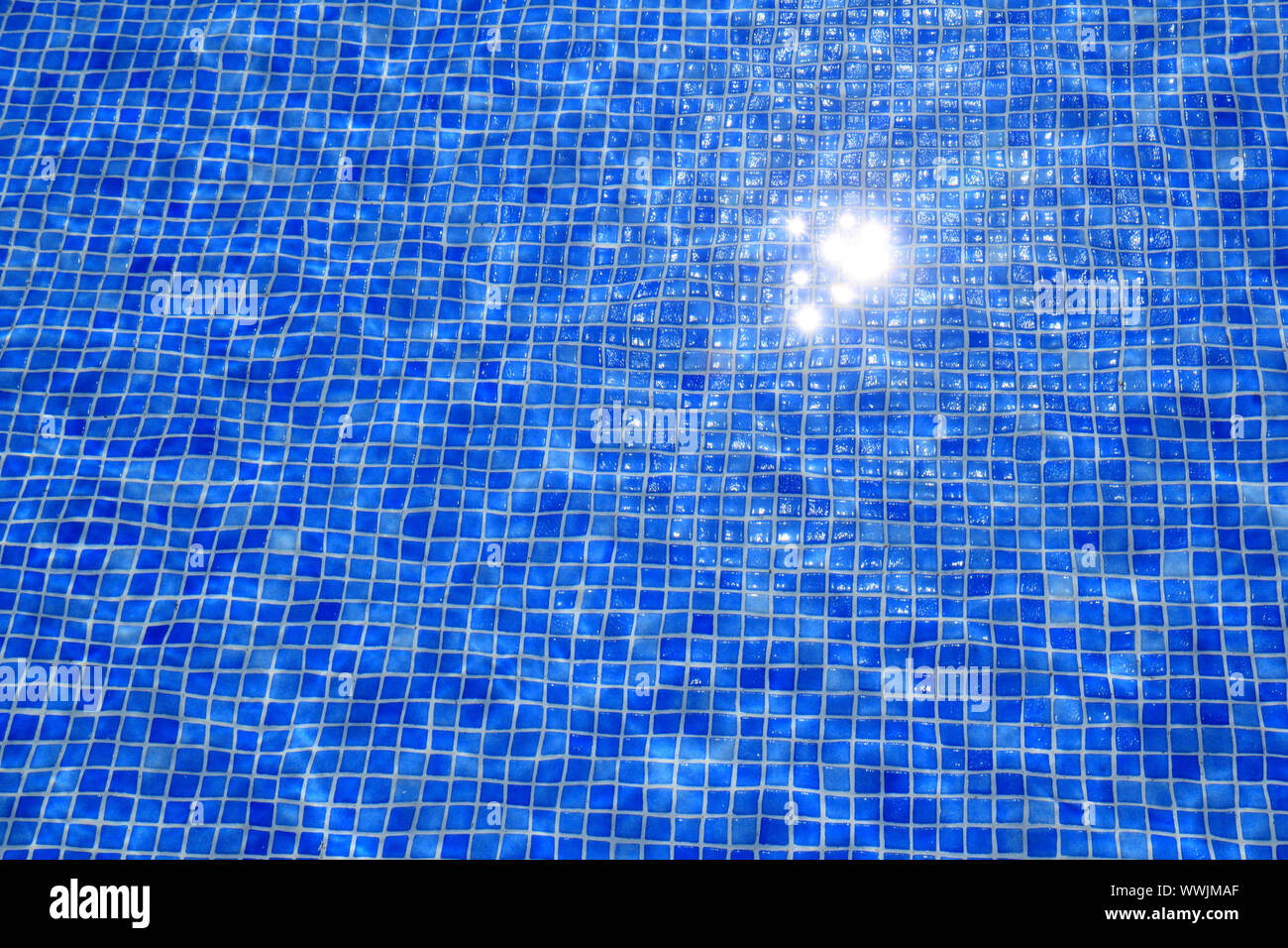 blue tiles swimming pool water reflection texture Stock Photo - Alamy